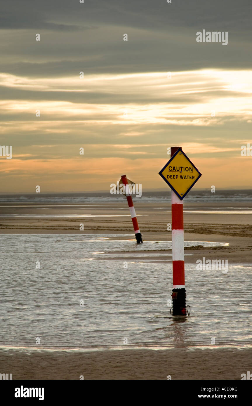 deep water signs in blackpool seaside Stock Photo - Alamy