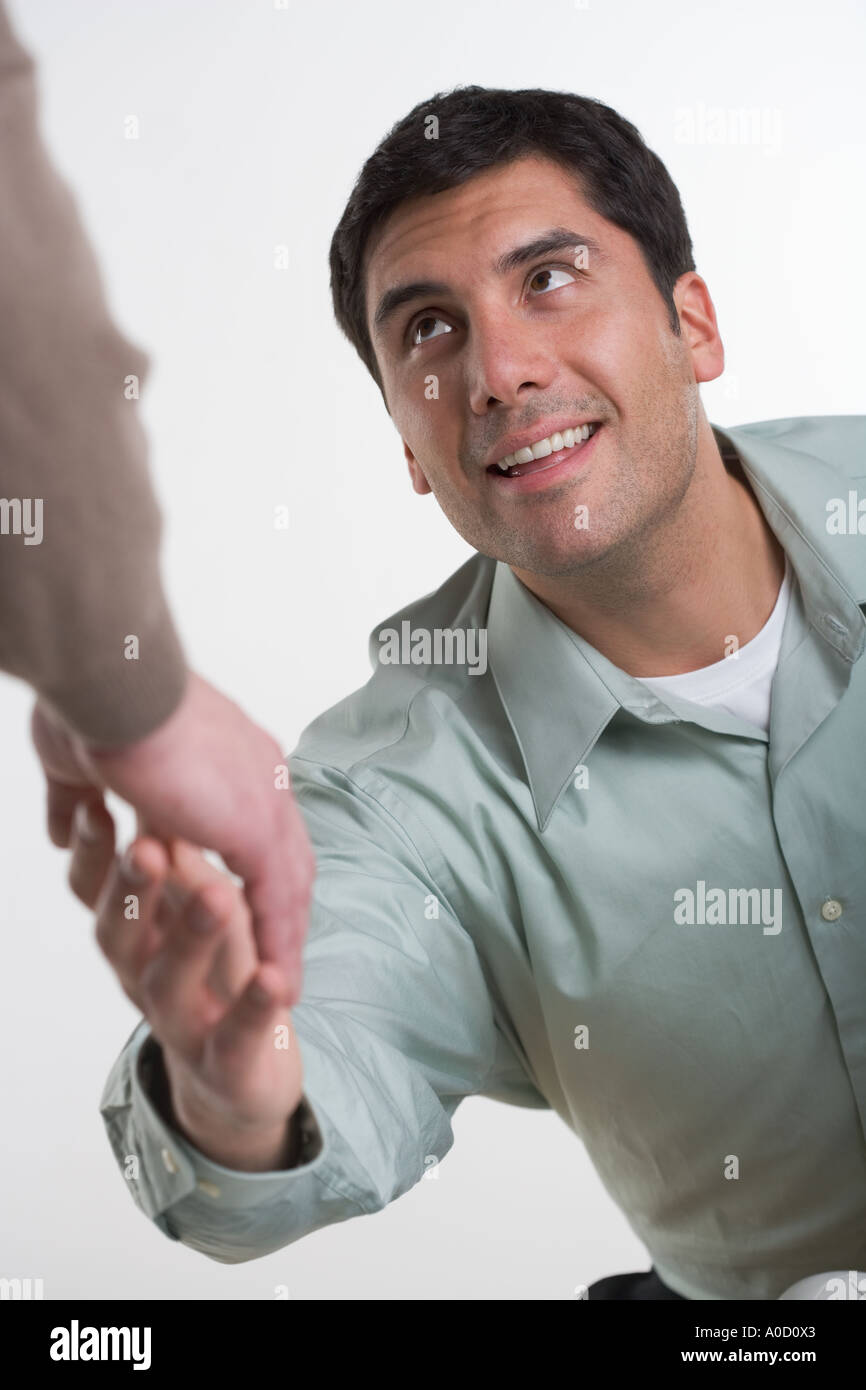 Two men shaking hands Stock Photo - Alamy