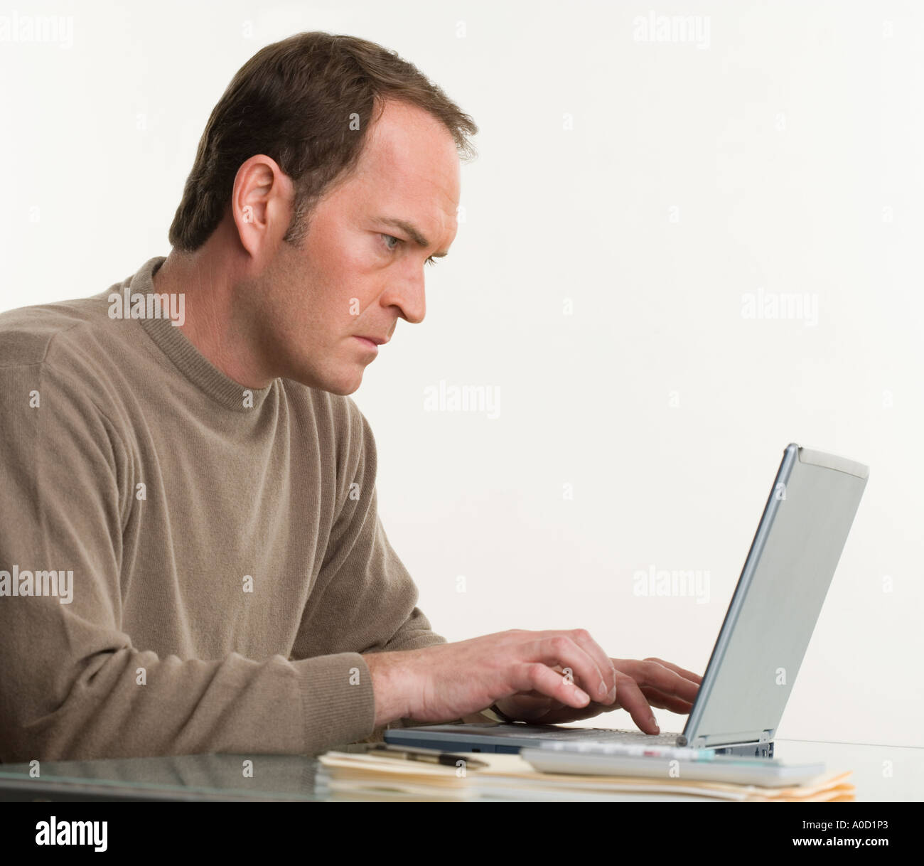 Portrait of a man at his computer Stock Photo - Alamy