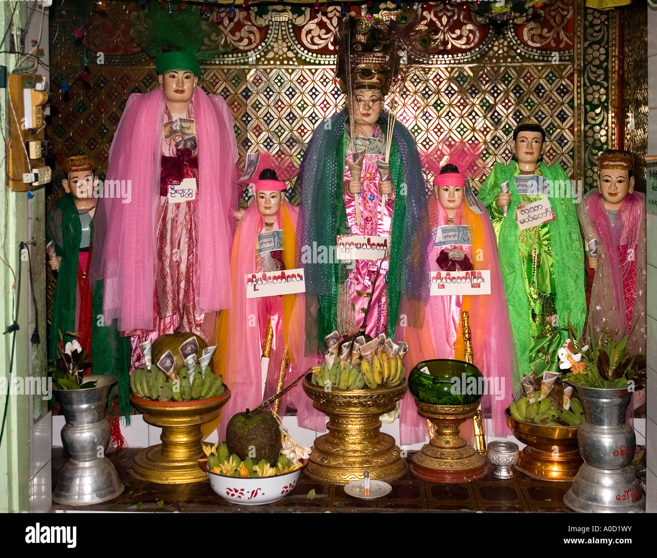 Stock photograph of offerings and idols at a Nat Shrine at Mount Popa ...