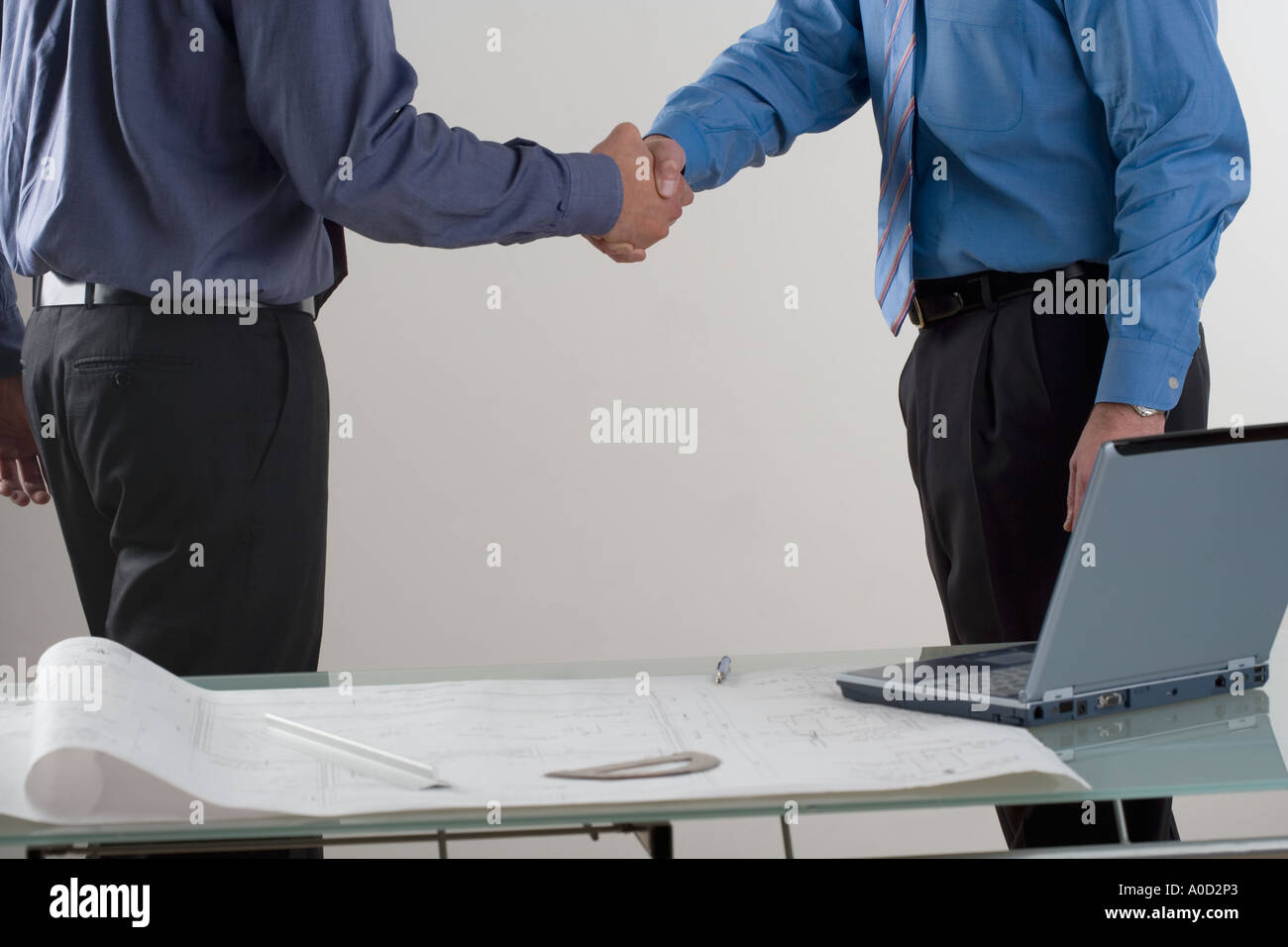 Two men shaking hands Stock Photo - Alamy
