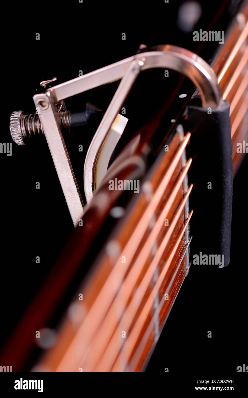 Guitar fretboard with capo hi-res stock photography and images - Alamy