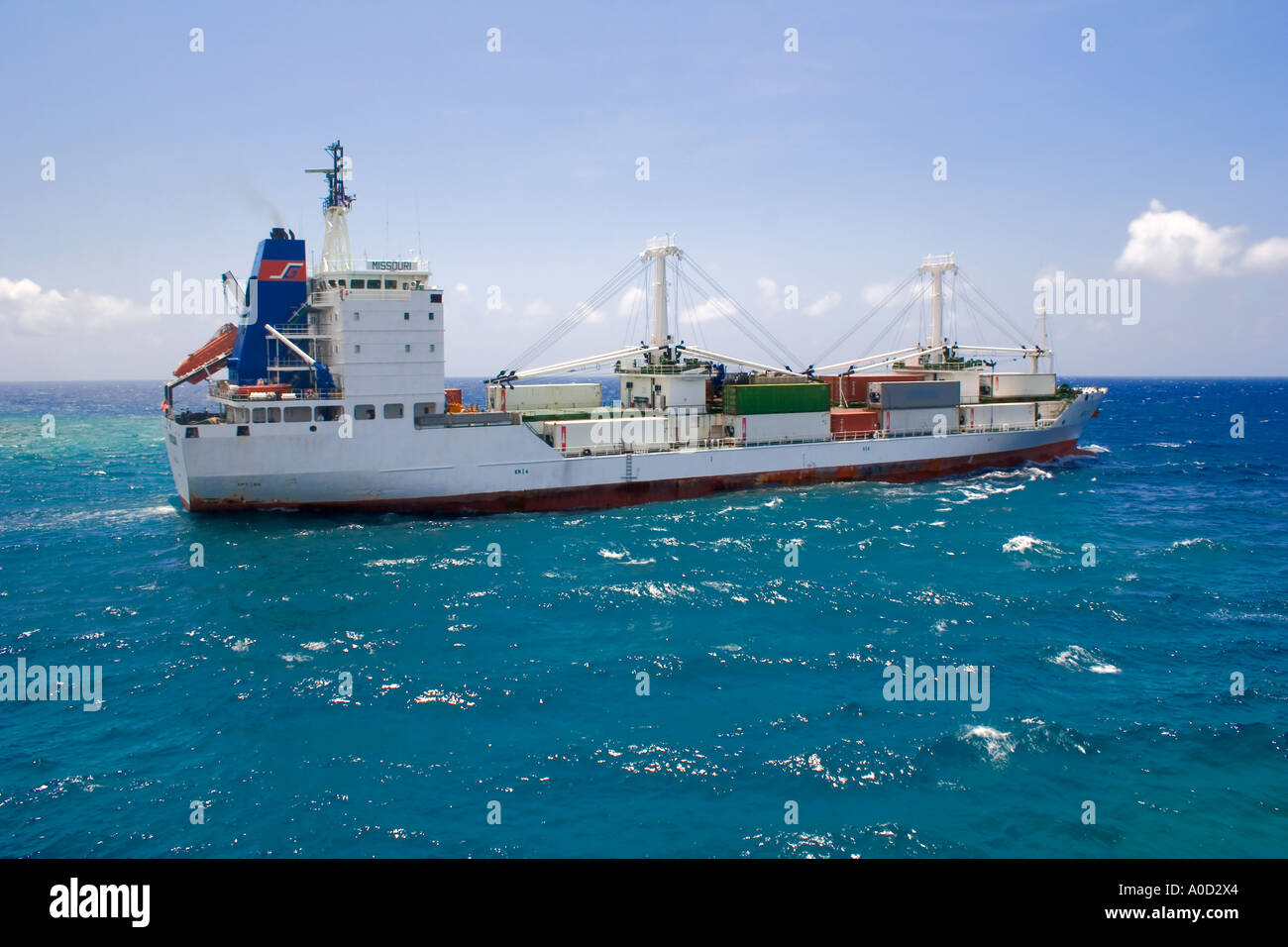 Container ship setting sail out of the St Ana Bay in Curacao ...
