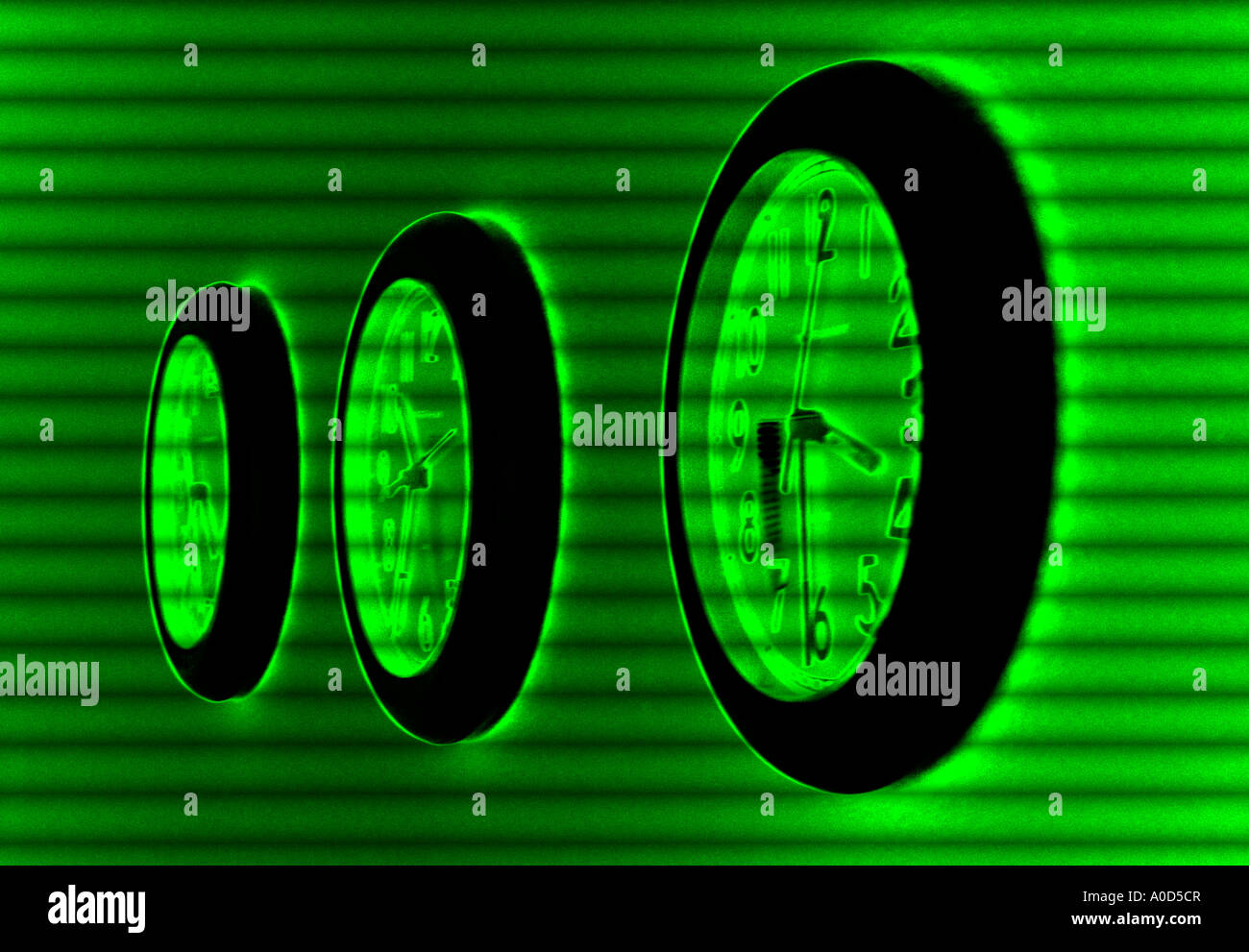 three office wall clocks set at different times Stock Photo - Alamy