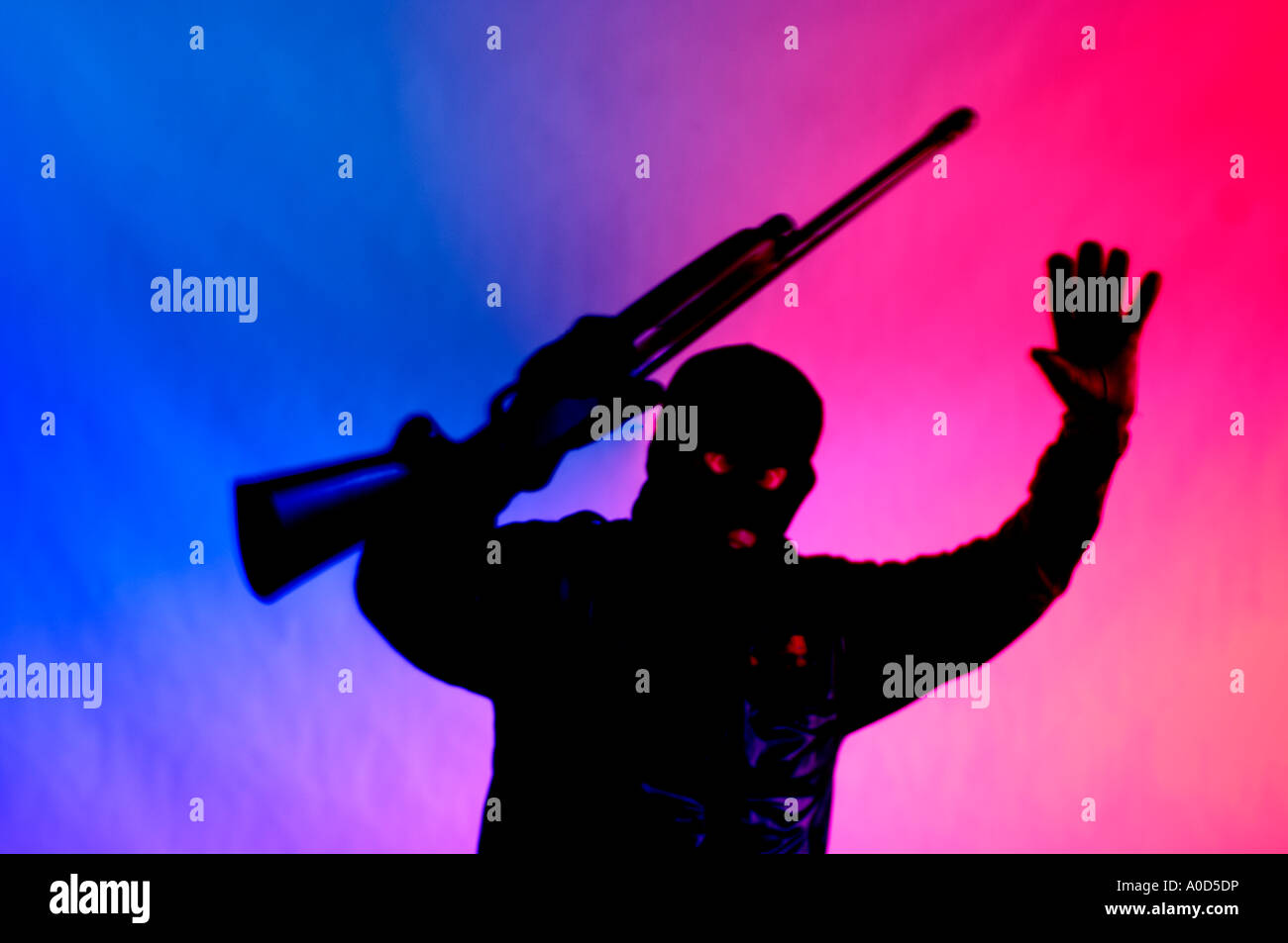 male terrorist wearing ski mask charging with large shot gun Stock ...