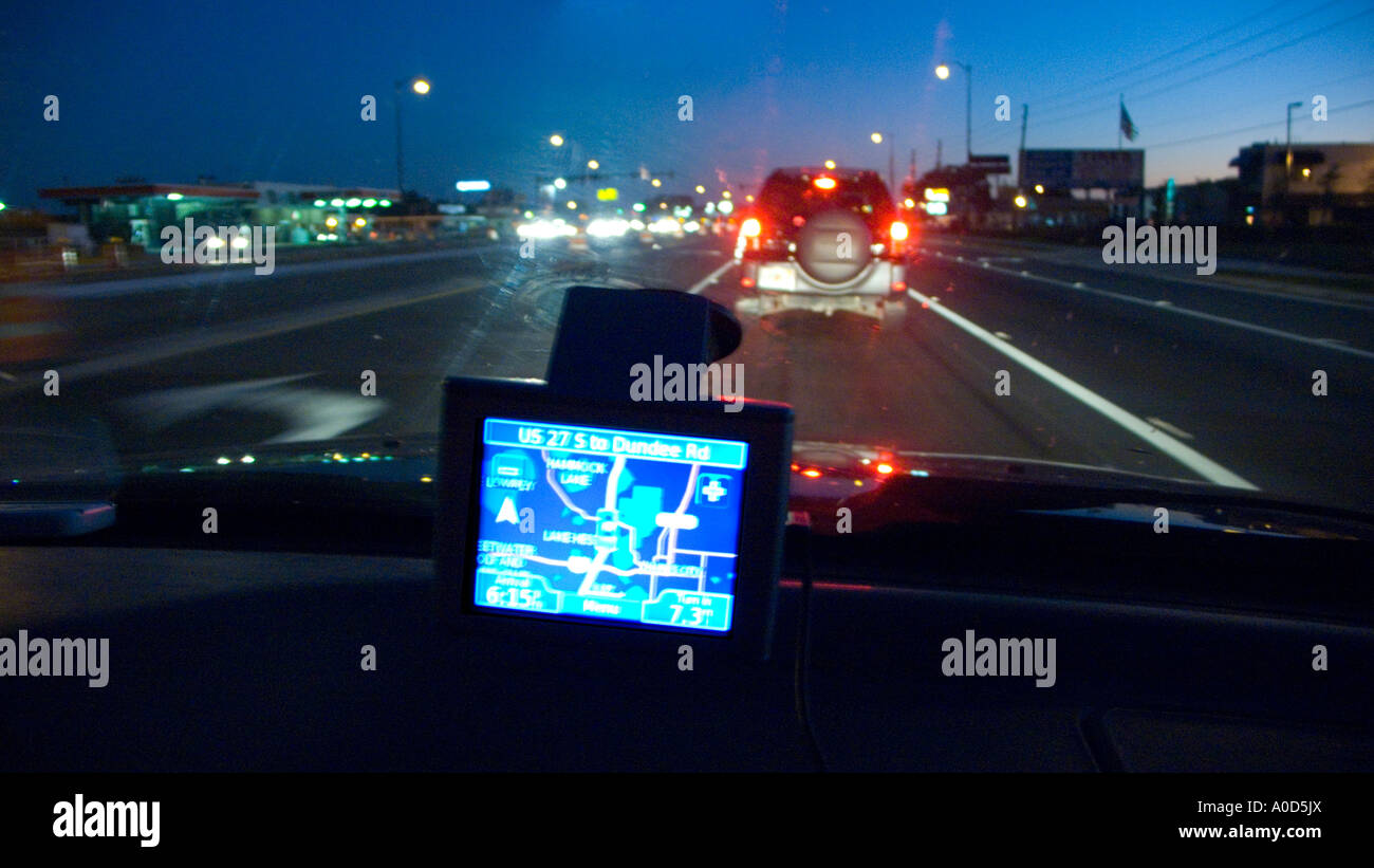 display of a GPS navigation system on car dashboard at night Stock ...