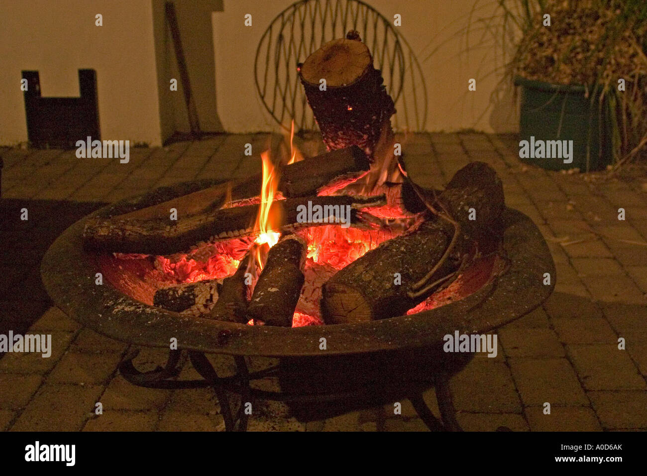 cinders and fire in couldron bbq close up of fire Stock Photo - Alamy