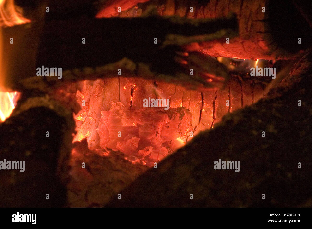cinders and fire in couldron bbq close up of fire Stock Photo - Alamy