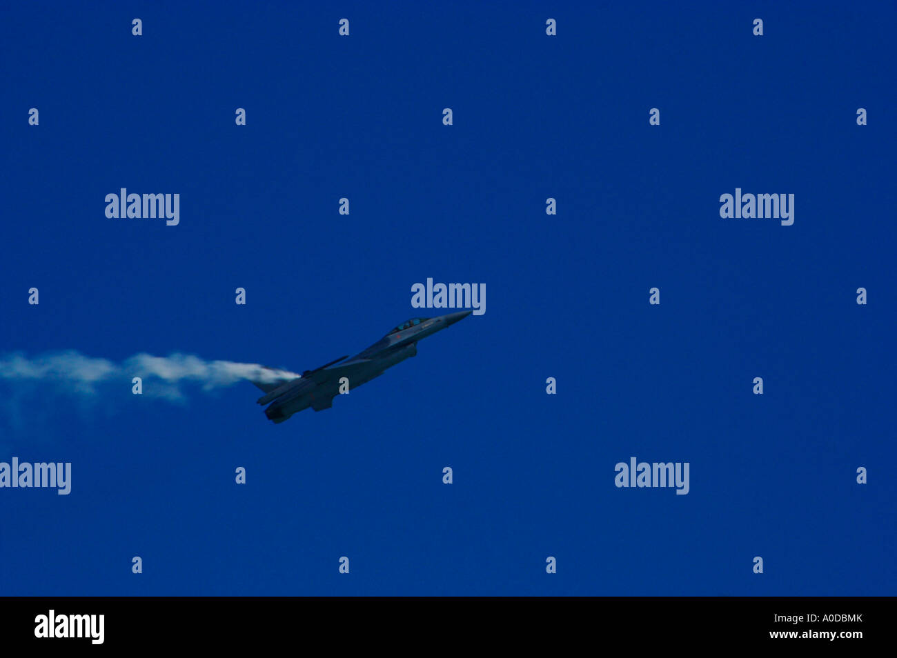 Fighter jet and contrail Stock Photo - Alamy