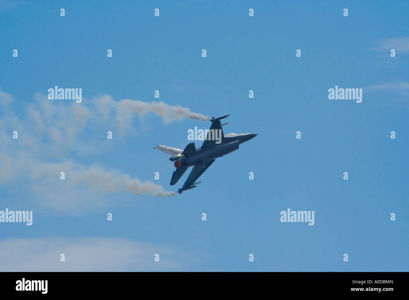 Fighter jet and contrail Stock Photo - Alamy