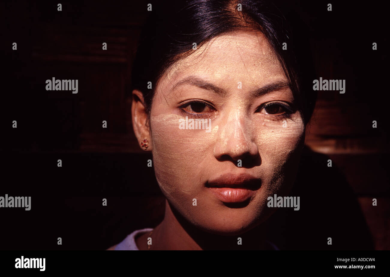 a beautiful young Burmese women wears Tanaka on her face Stock Photo ...