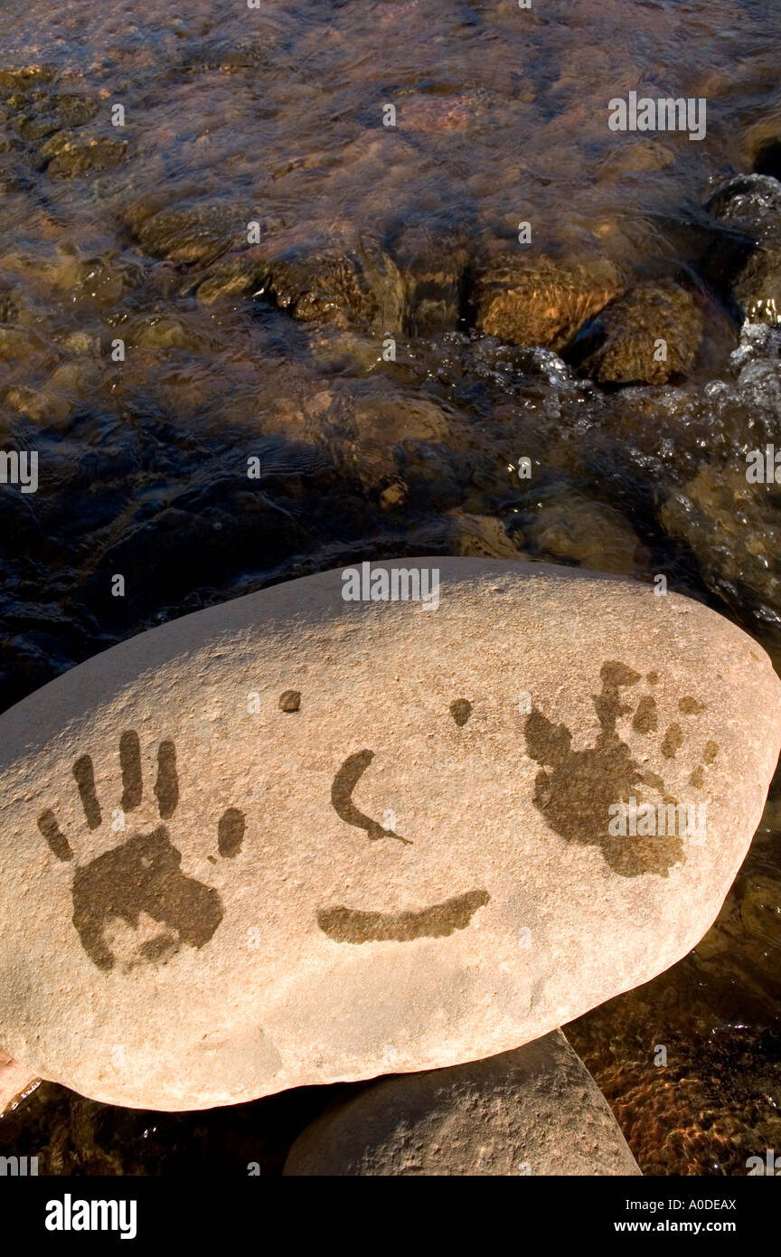 Smiley face painted on rock hi-res stock photography and images - Alamy
