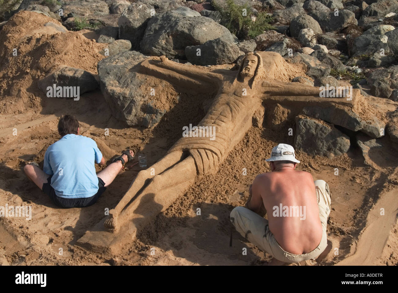 Sand sculptors working Stock Photo - Alamy