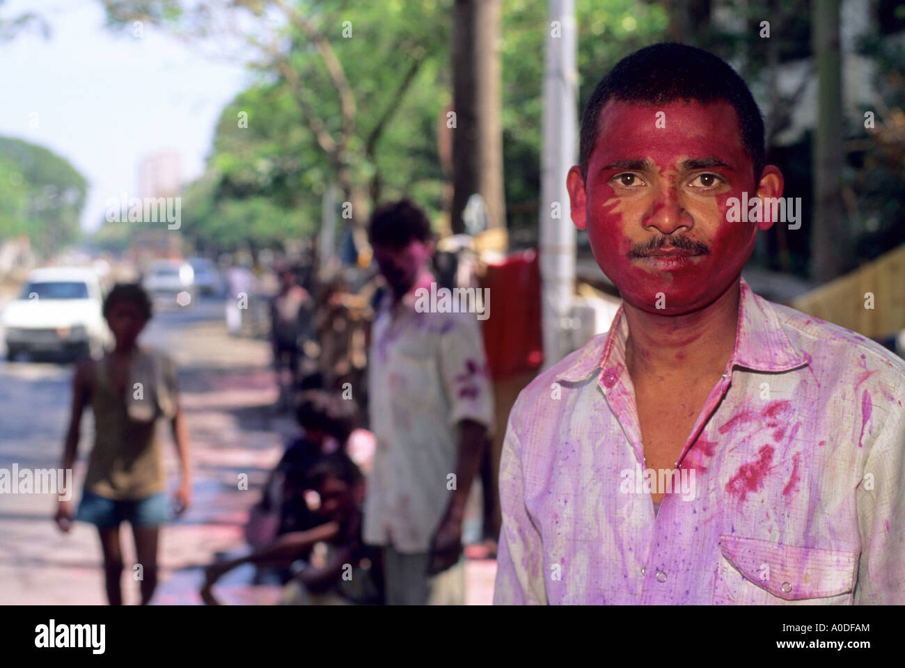 An Indian man wearing Holi Festival colors in India Stock Photo - Alamy