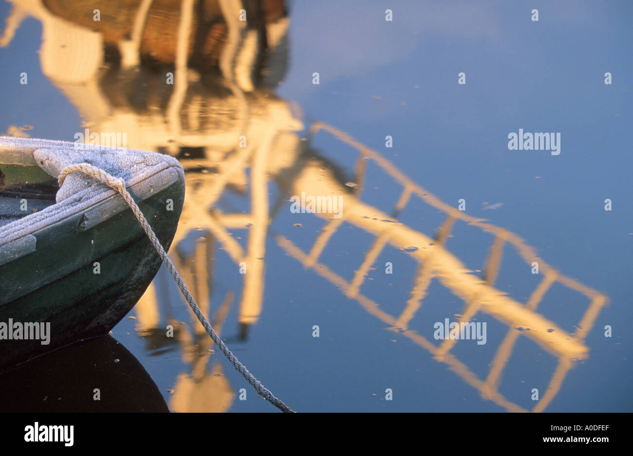 FROST COVERED REED CUTTERS BOAT, REFLECTED IN RIVER ANT, SAILS OF A ...