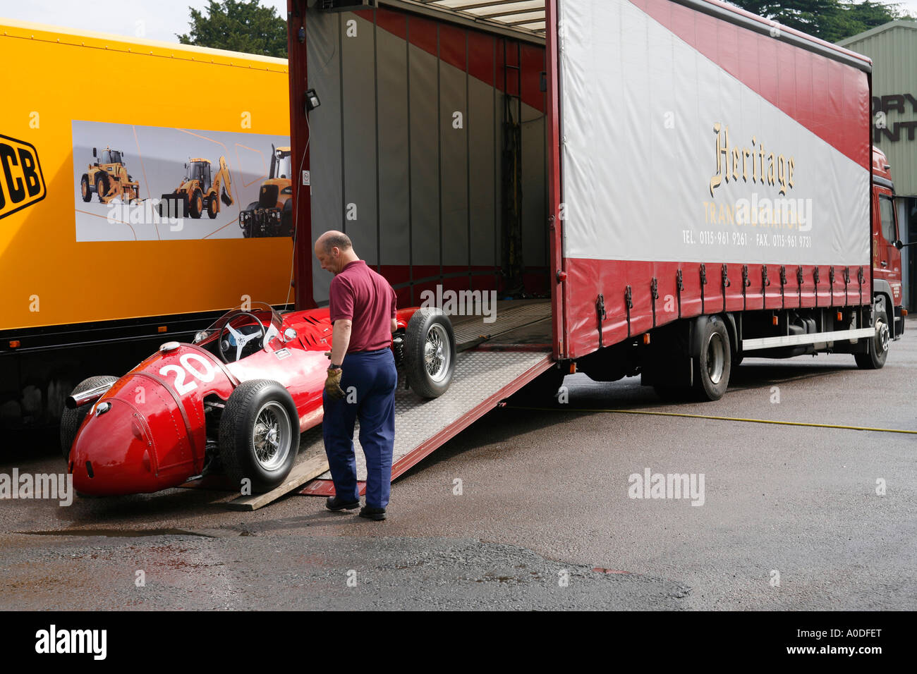 A Maserati Formula 1 Racing car being unloaded from a car transporter ...