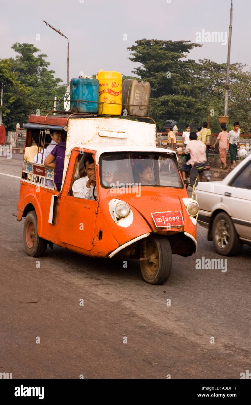 Stock photograph of a three wheel orange taxi at Bago in Myanmar Stock ...