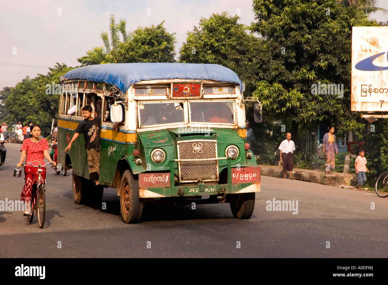 Stock photograph of passengers riding in a local bus at Bago in Myanmar ...