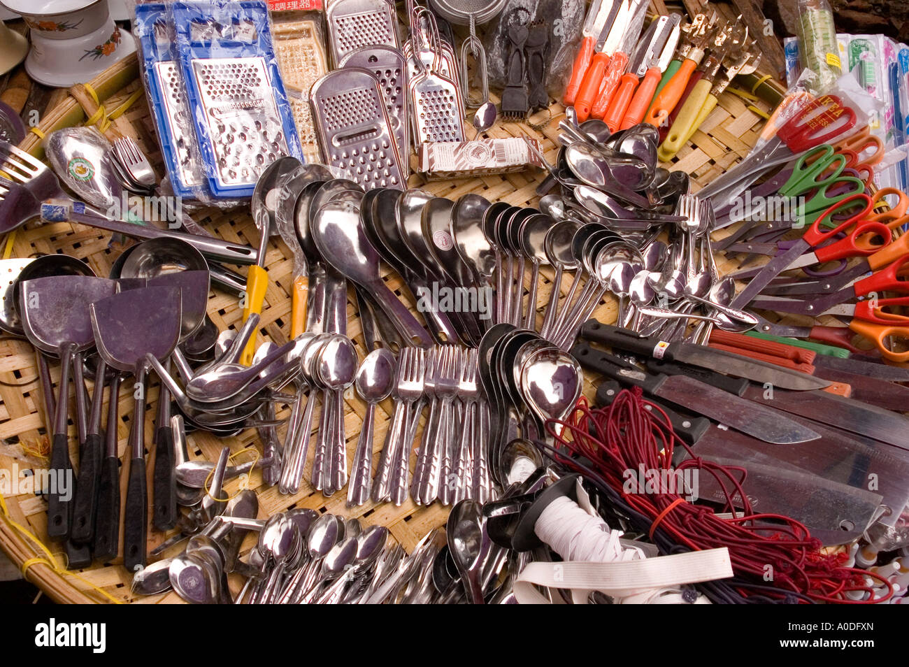 Stock photograph kitchen utensils on a market stall at Bago in Myanmar ...