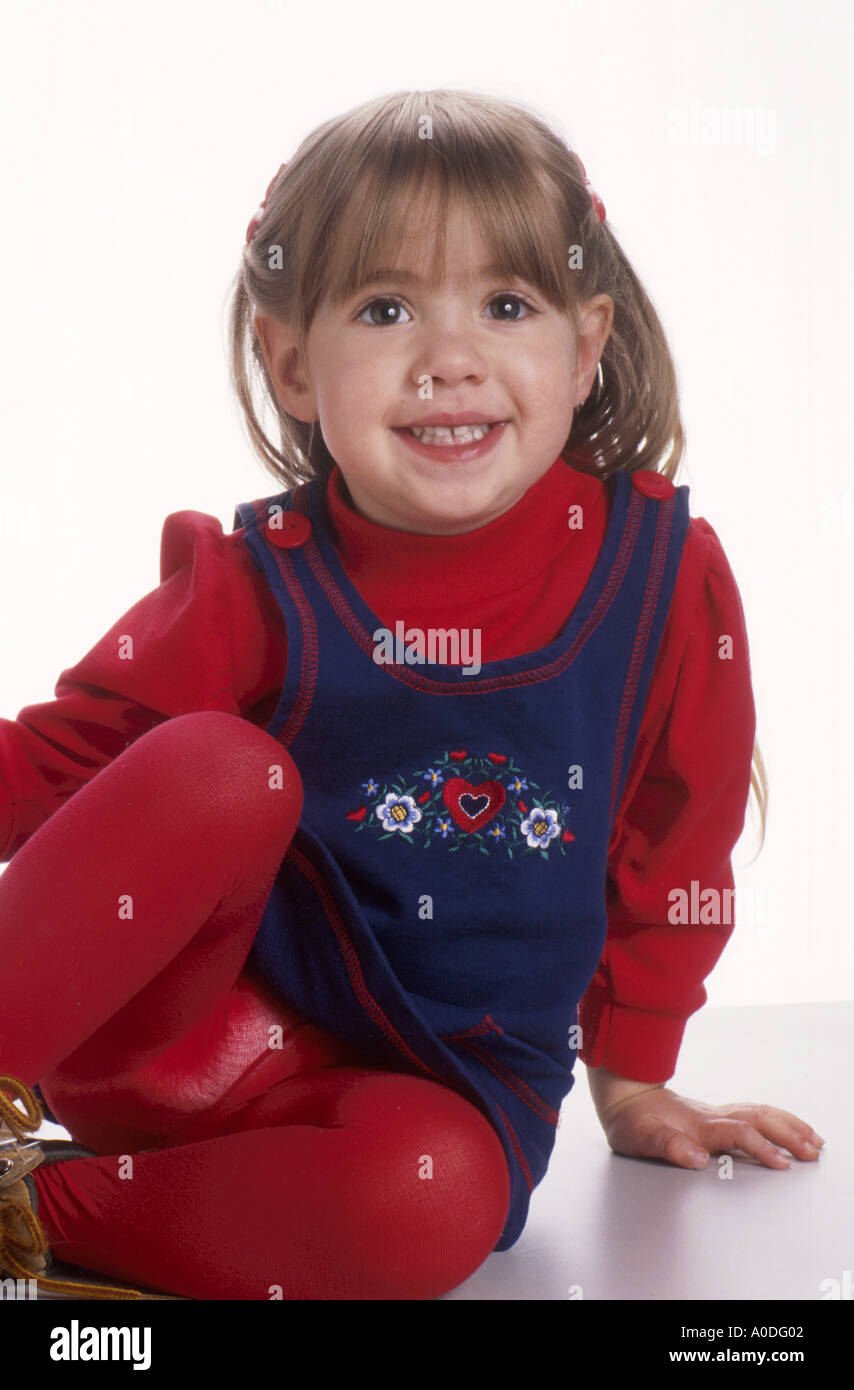 Expressive little girl posing Stock Photo - Alamy