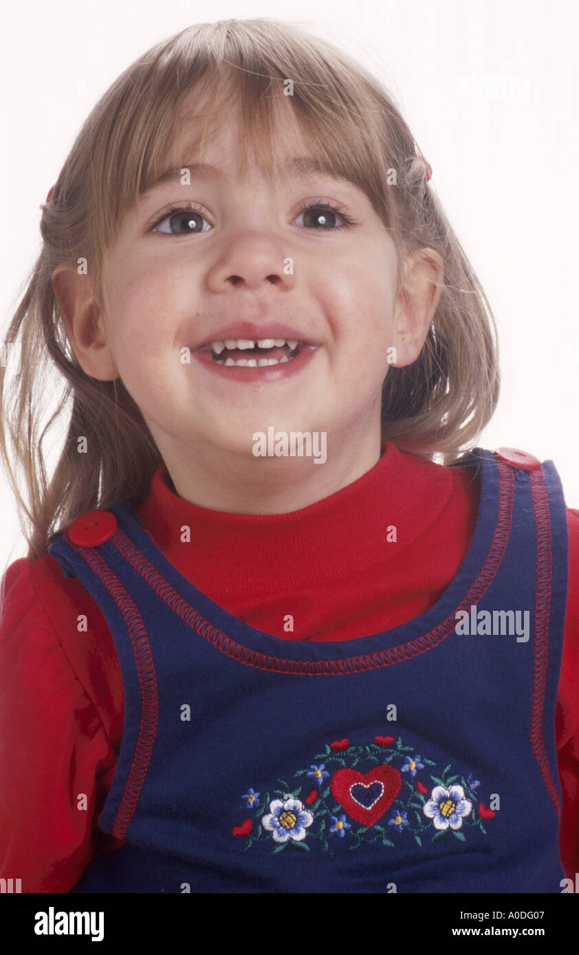 Expressive little girl posing Stock Photo - Alamy