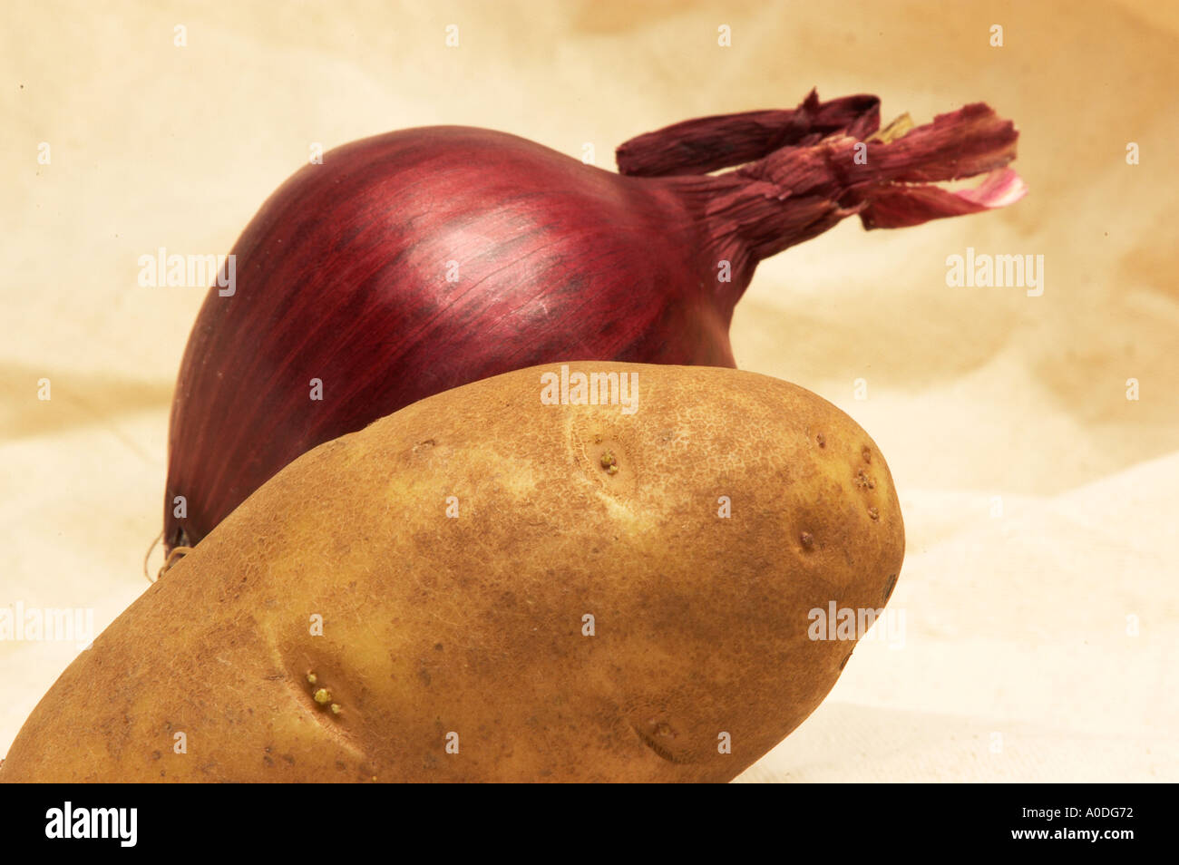 Still life with onion and potato Stock Photo - Alamy