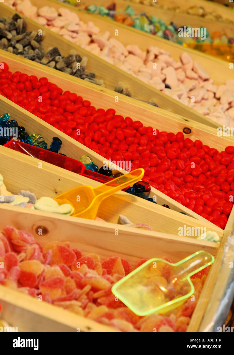 A Portrait Photograph of Various Sweets for Sale on a Market Stall ...
