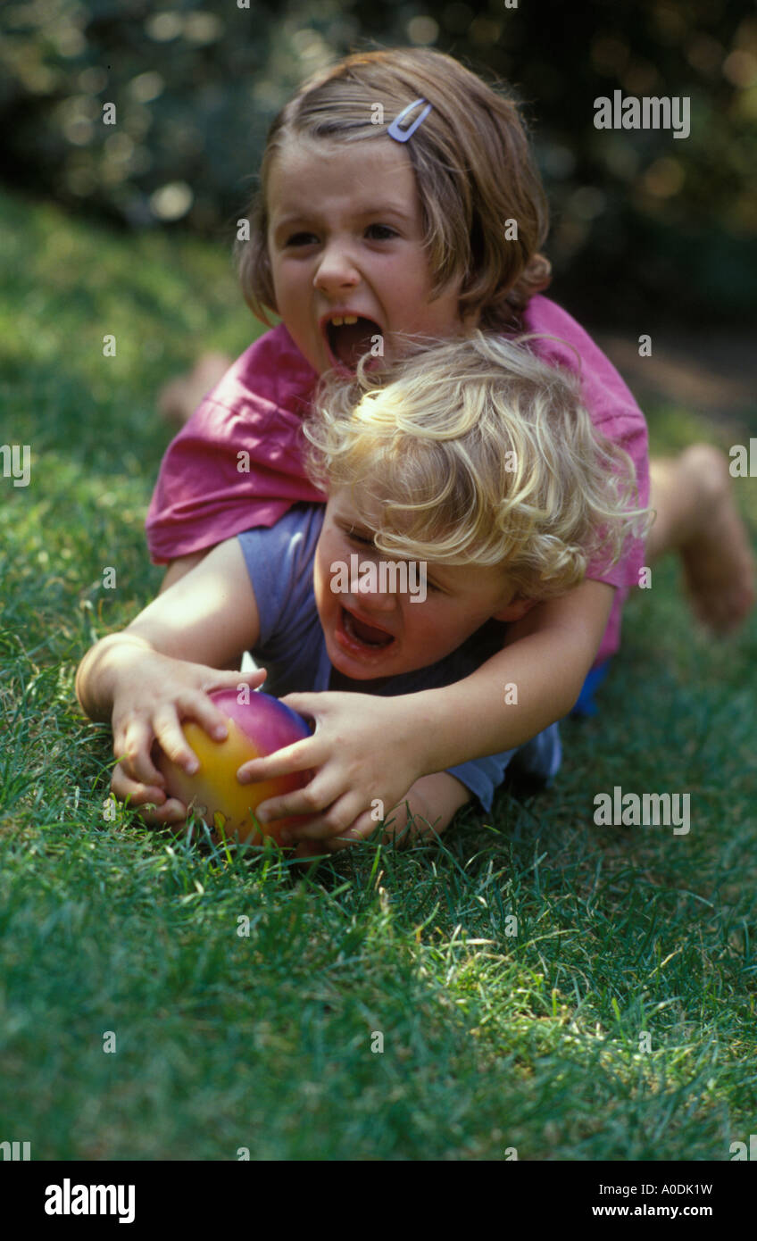 Children fighting hi-res stock photography and images - Alamy