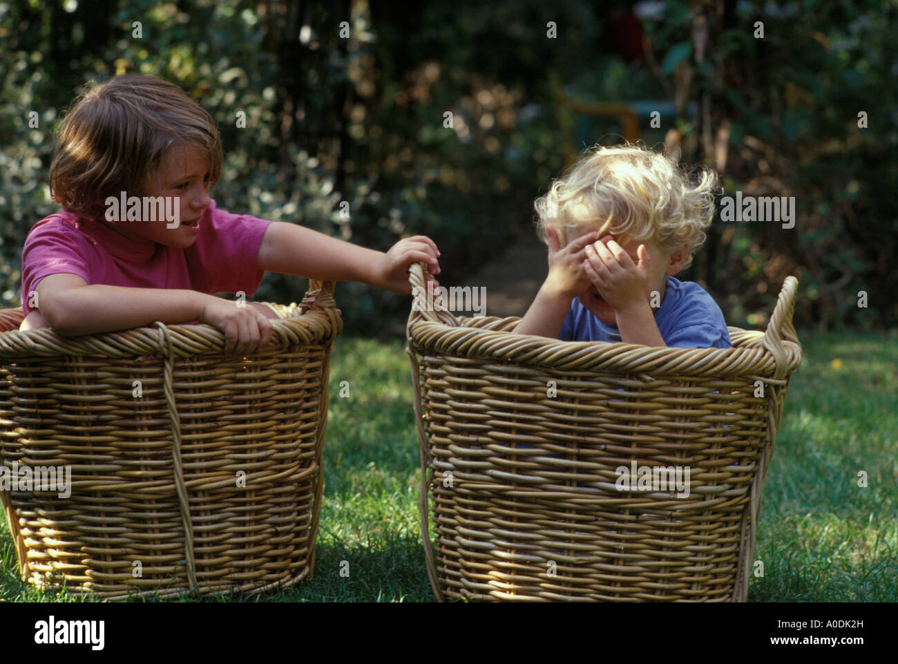 Children with baskets hi-res stock photography and images - Alamy