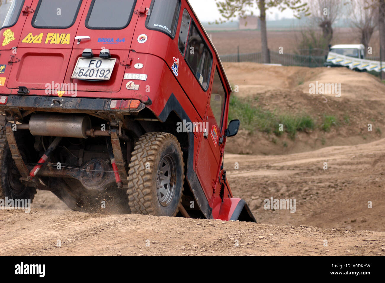 4x4 truck in a weekend race at motocross track Stock Photo - Alamy