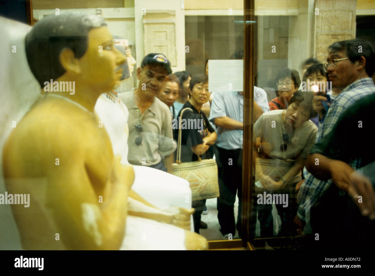 Egypt Cairo Egyptian Museum japanese watching the dwarf Seneb and his ...