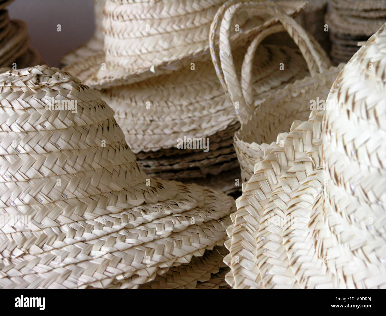 Hand made straw hats and bags Stock Photo - Alamy