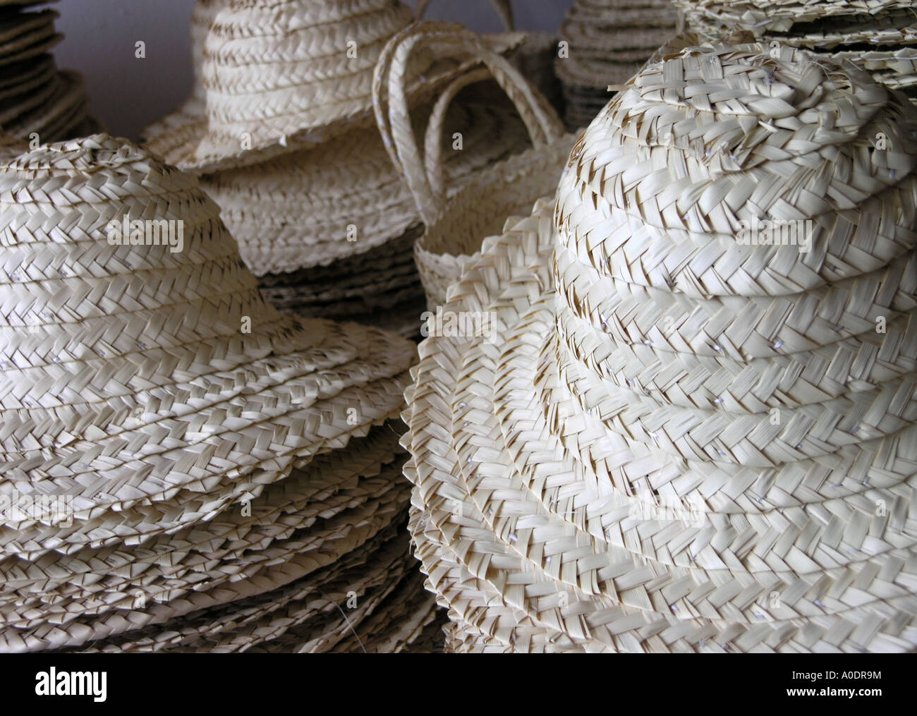 Hand made straw hats and bags Stock Photo - Alamy