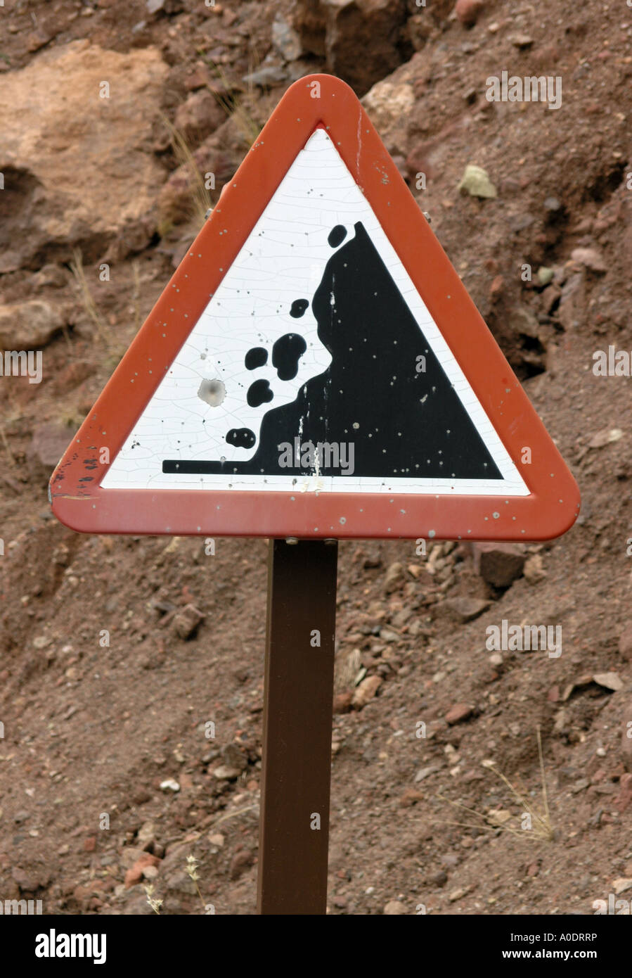 Warning Road Sign rock fall Stock Photo - Alamy