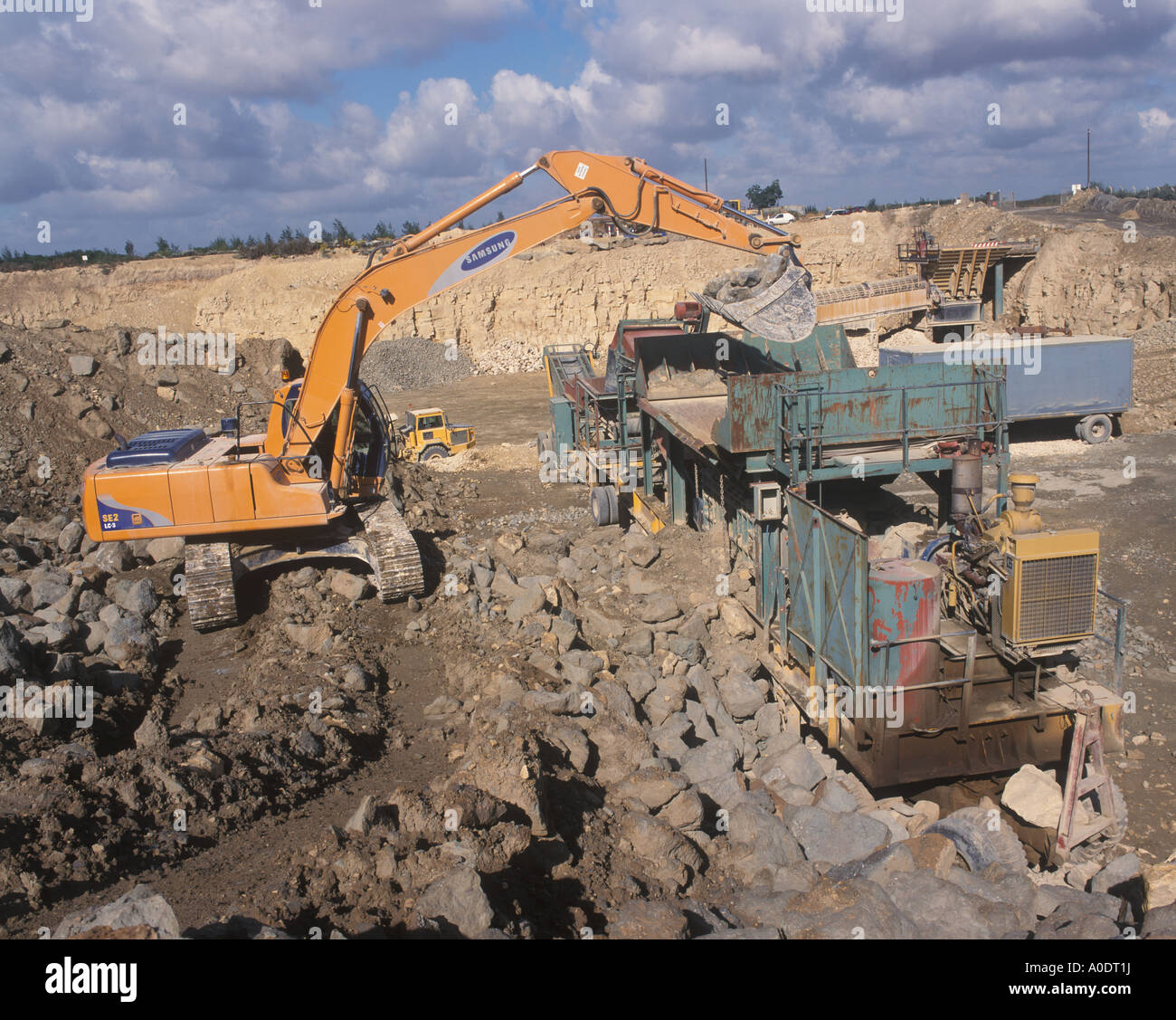 Quarrying on a commercial scale in open contryside excavating sorting ...