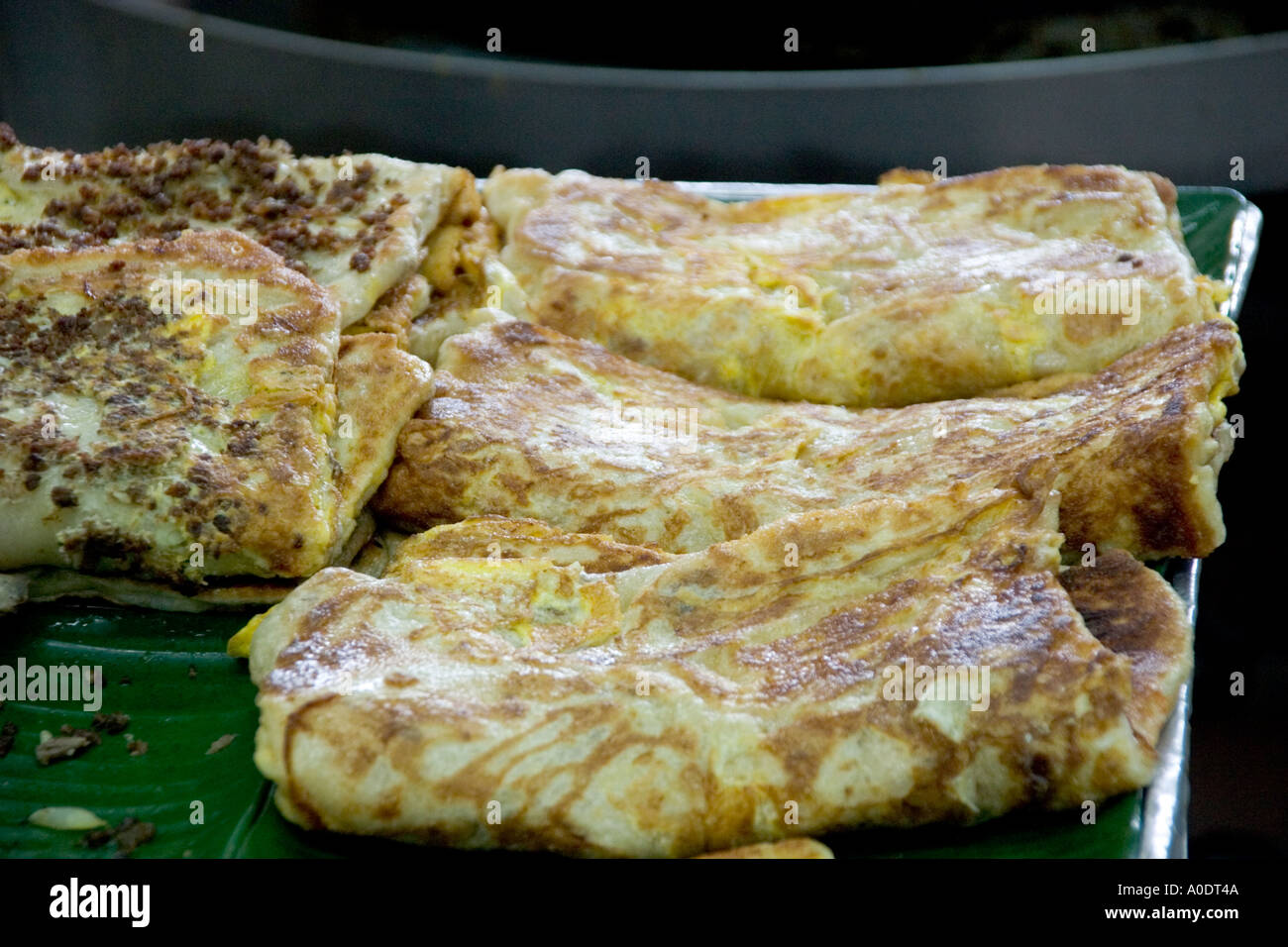 Murtabak stuffed roti bread in an Indian restaurant in Singapore Stock ...