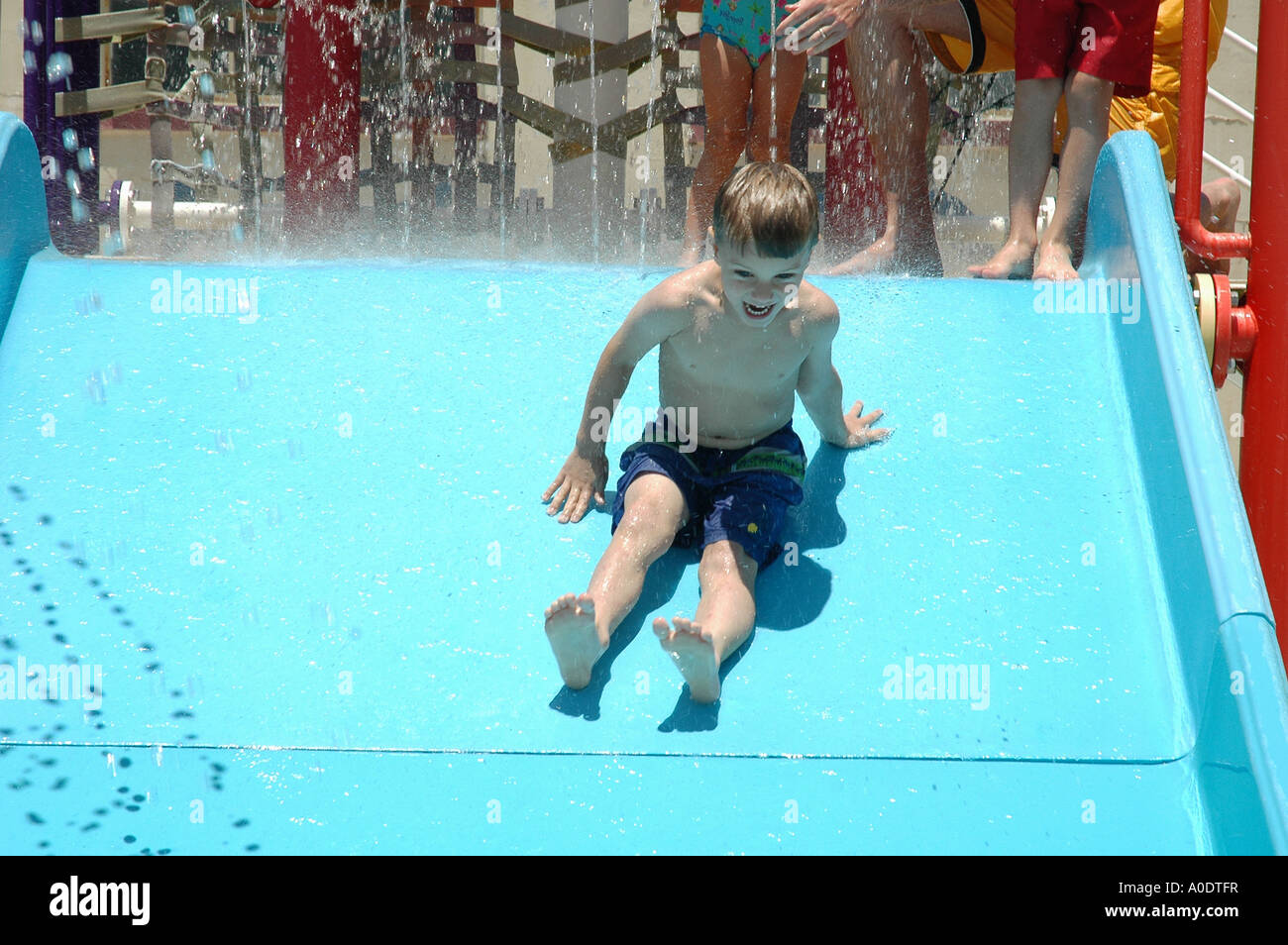 Water slides and child hi-res stock photography and images - Alamy