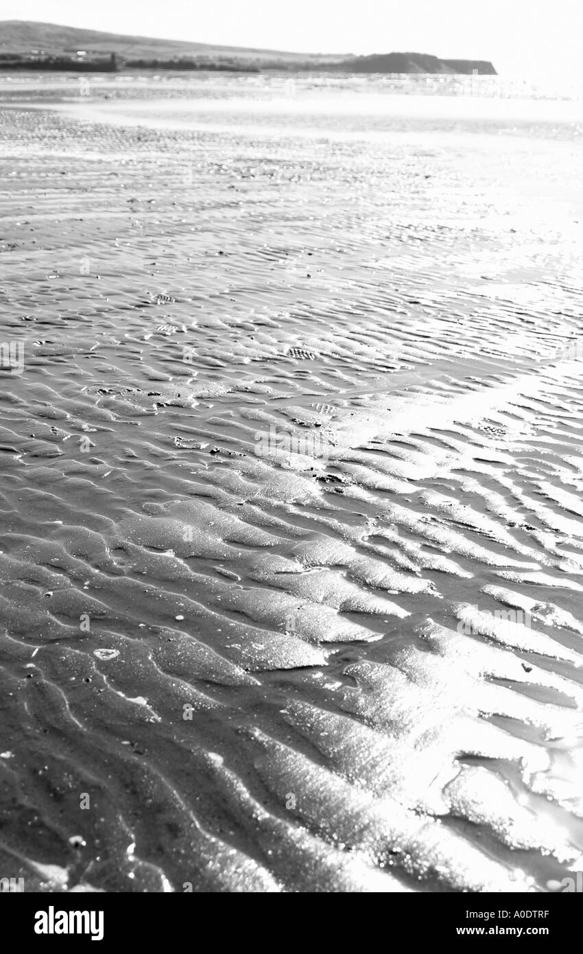 Ripples in sand on beach Stock Photo - Alamy