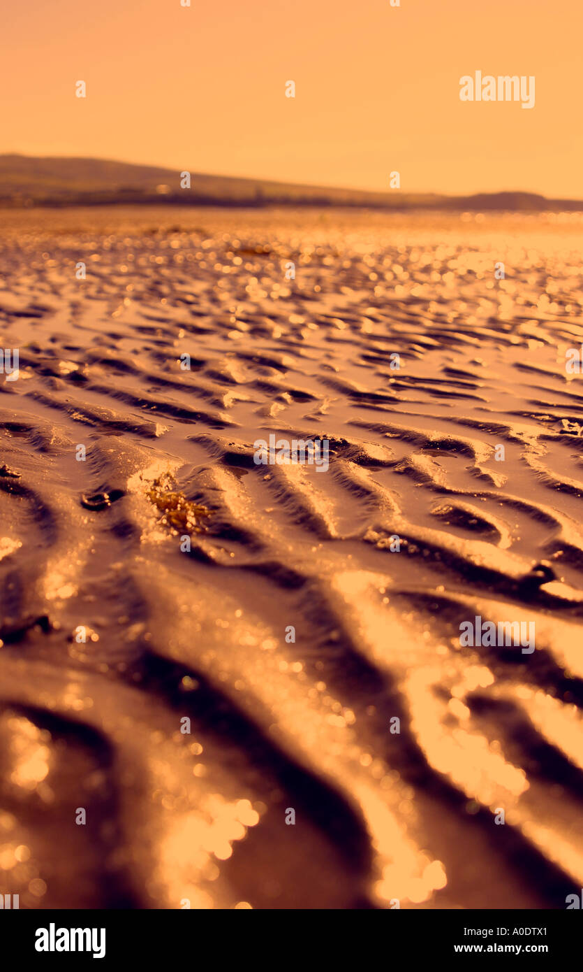 Ripples in sand on beach Stock Photo - Alamy