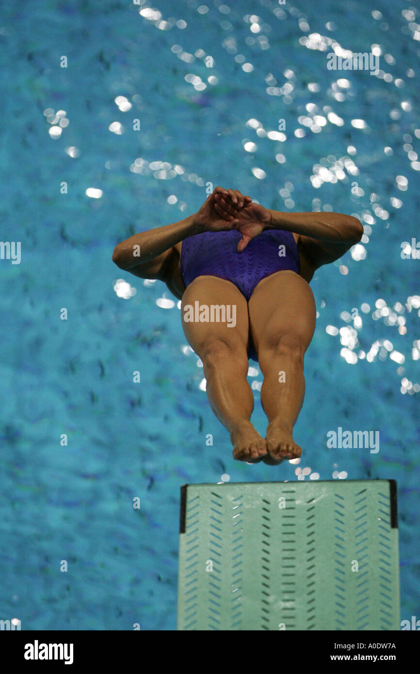 Women doing a practice springboard dive at the 2004 Athens Olympics ...