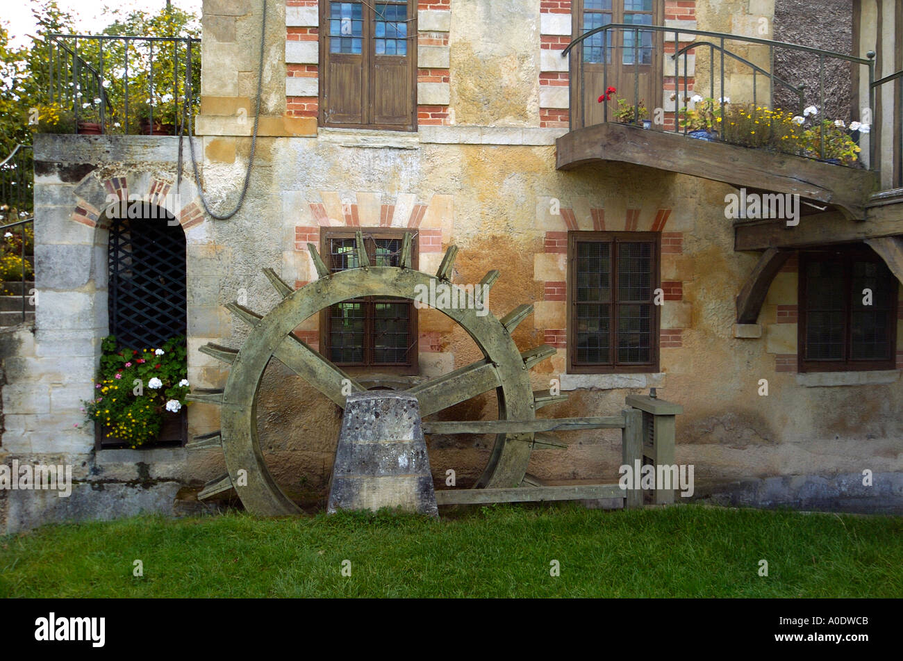 Old house with watermill Stock Photo - Alamy