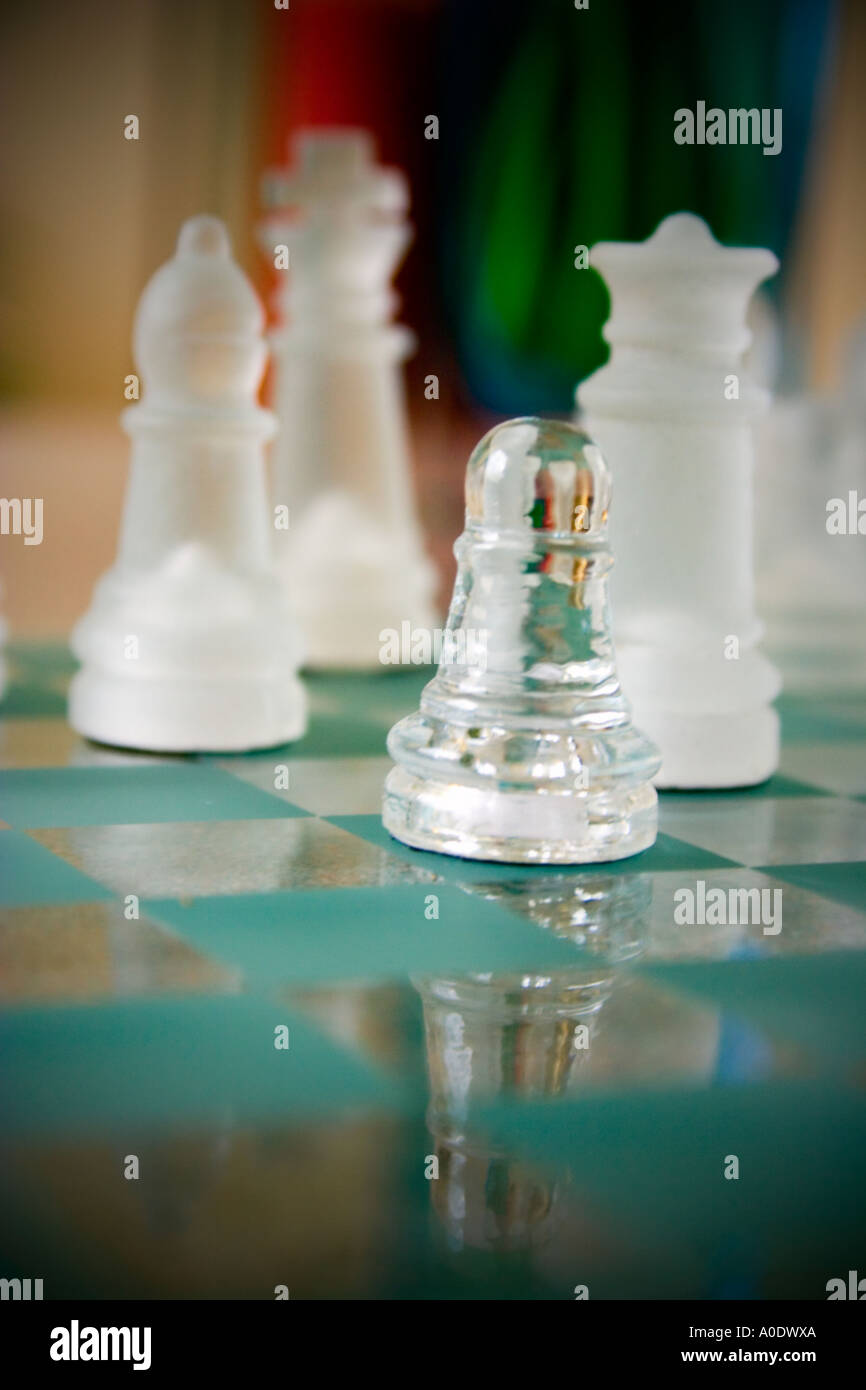 Transparent chess pieces on chessboard Stock Photo - Alamy