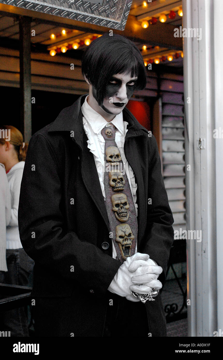 Young man acting as monster at attraction Stock Photo - Alamy