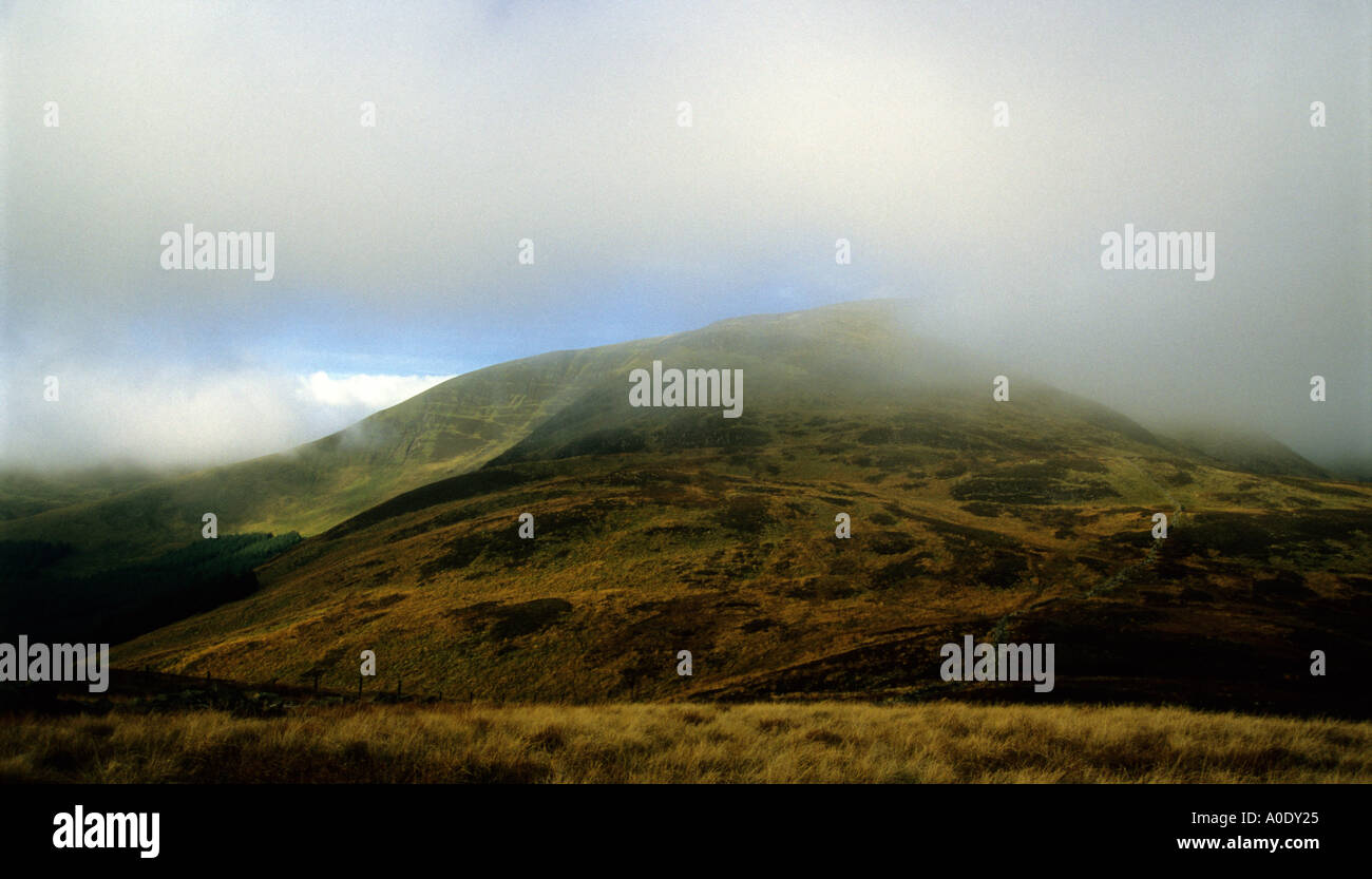 View towards cloud shrouded White Coomb Stock Photo - Alamy