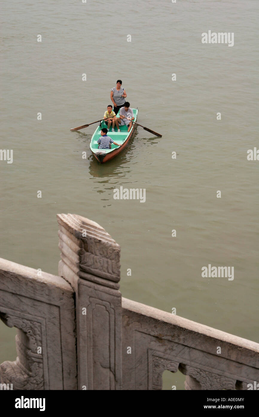 Chinese tourists boating on Lake Kunming, at the Summer Palace, Beijing ...