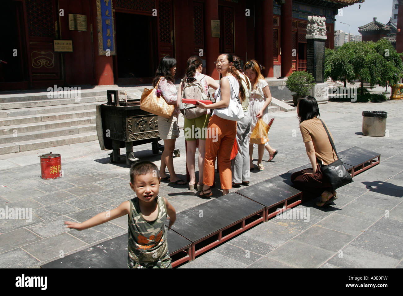Chinese tourists in the 17th century Tibetan Lama Temple, Bejing, China ...
