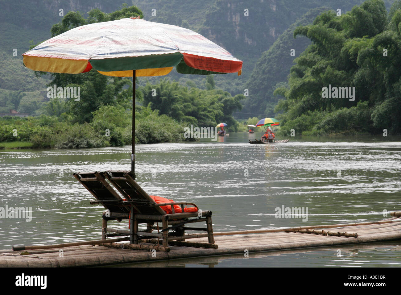 Empty tourist raft on the river Jinbao He, Southwest China Stock Photo ...