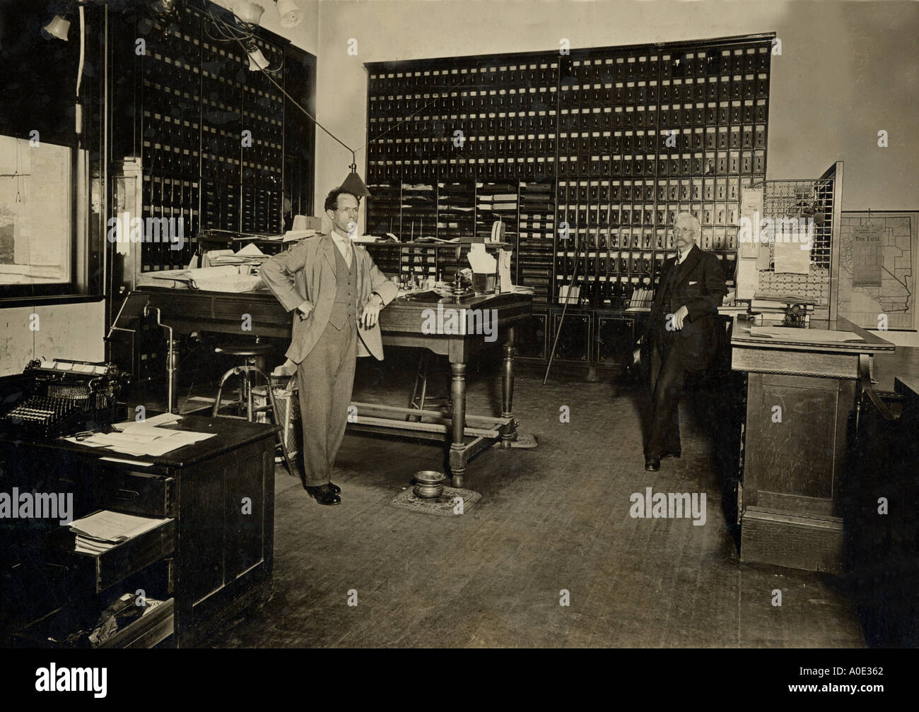 Two Men in Filing Office Stock Photo - Alamy