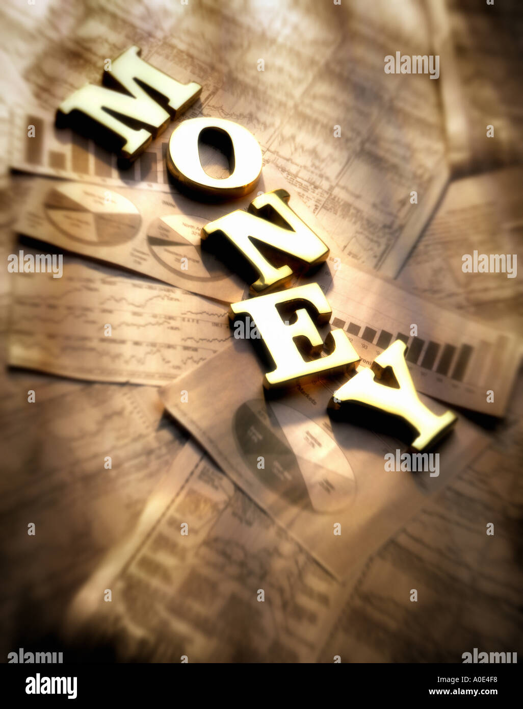 Brass letters spelling the word money Stock Photo - Alamy