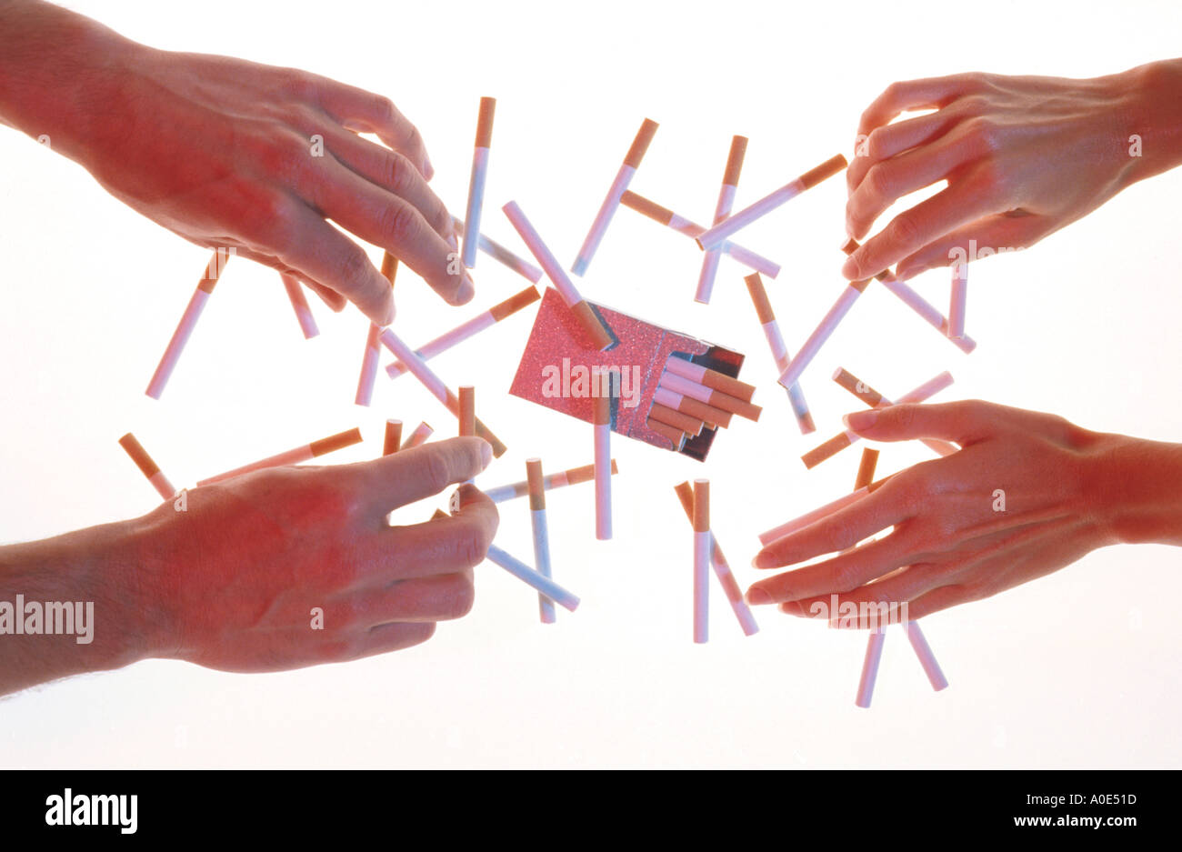 Cigarettes Hands close up smoking Stock Photo - Alamy